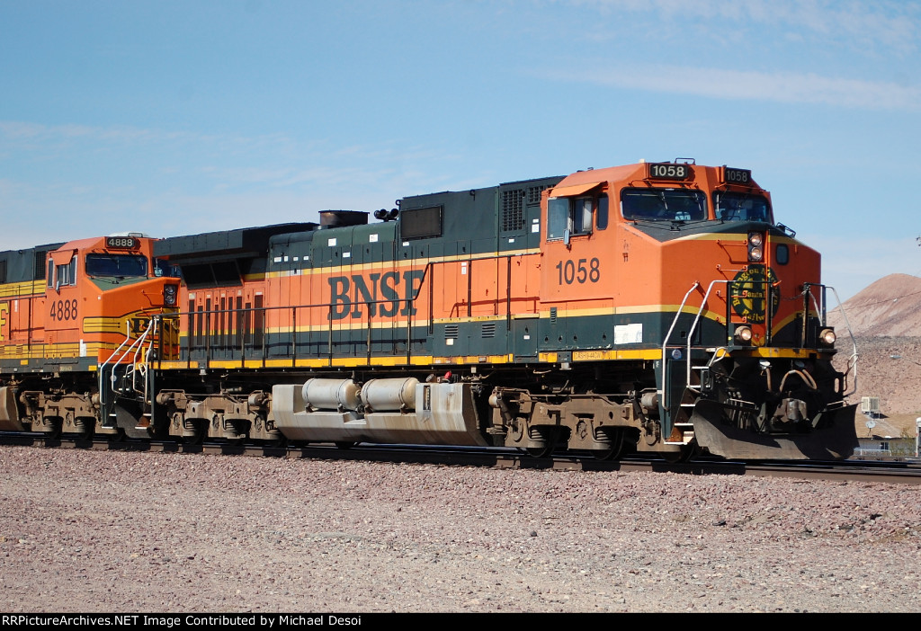 BNSF C44-9W #1058 leads an eastbound